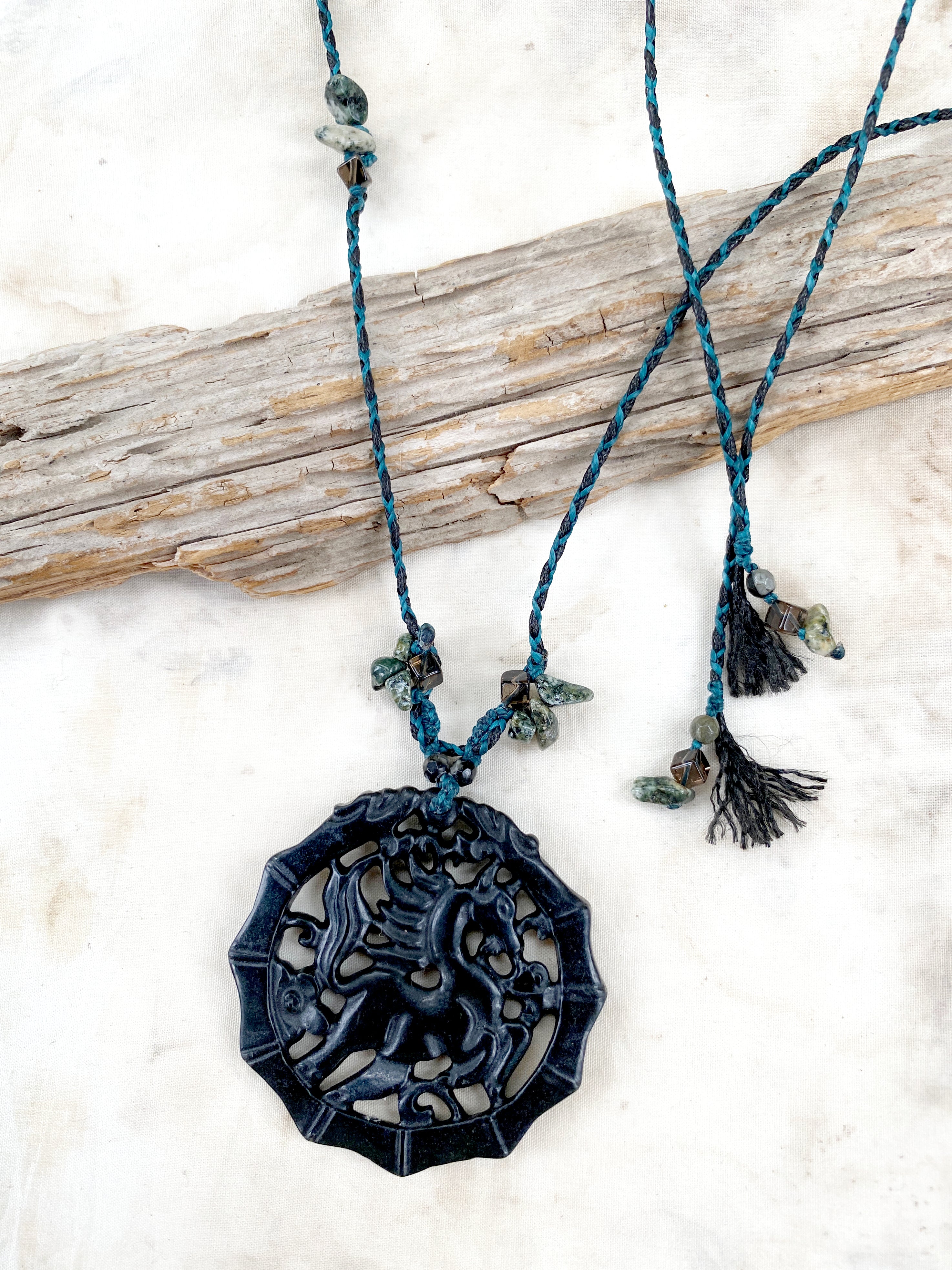 Jade talisman with carved horse symbol – Spirit Carrier