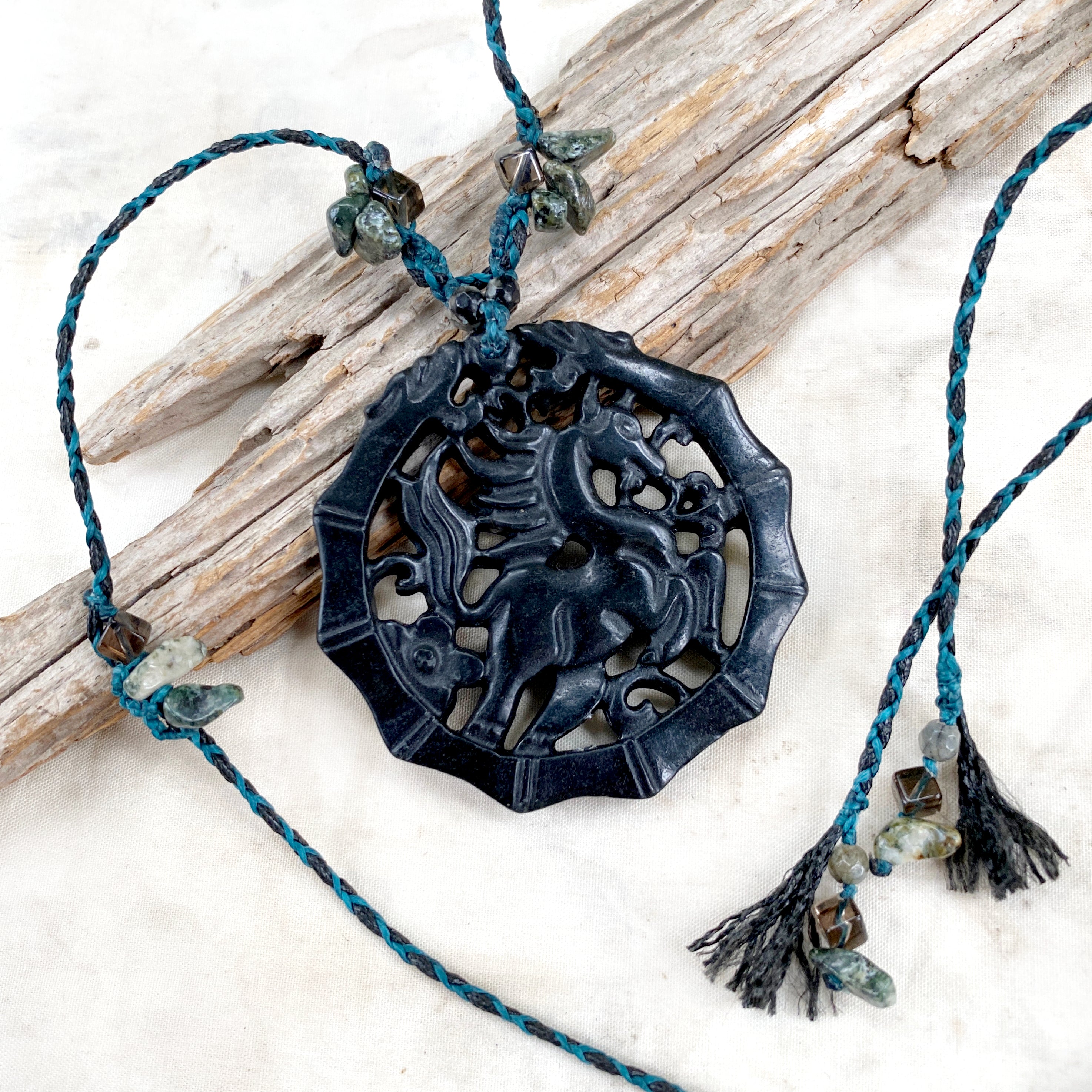 Jade talisman with carved horse symbol – Spirit Carrier
