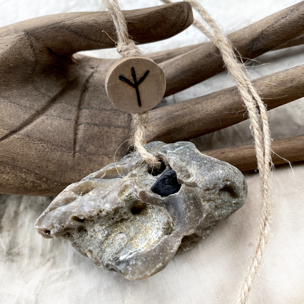 Flint hagstone ('holey' stone) with Algiz rune – Spirit Carrier