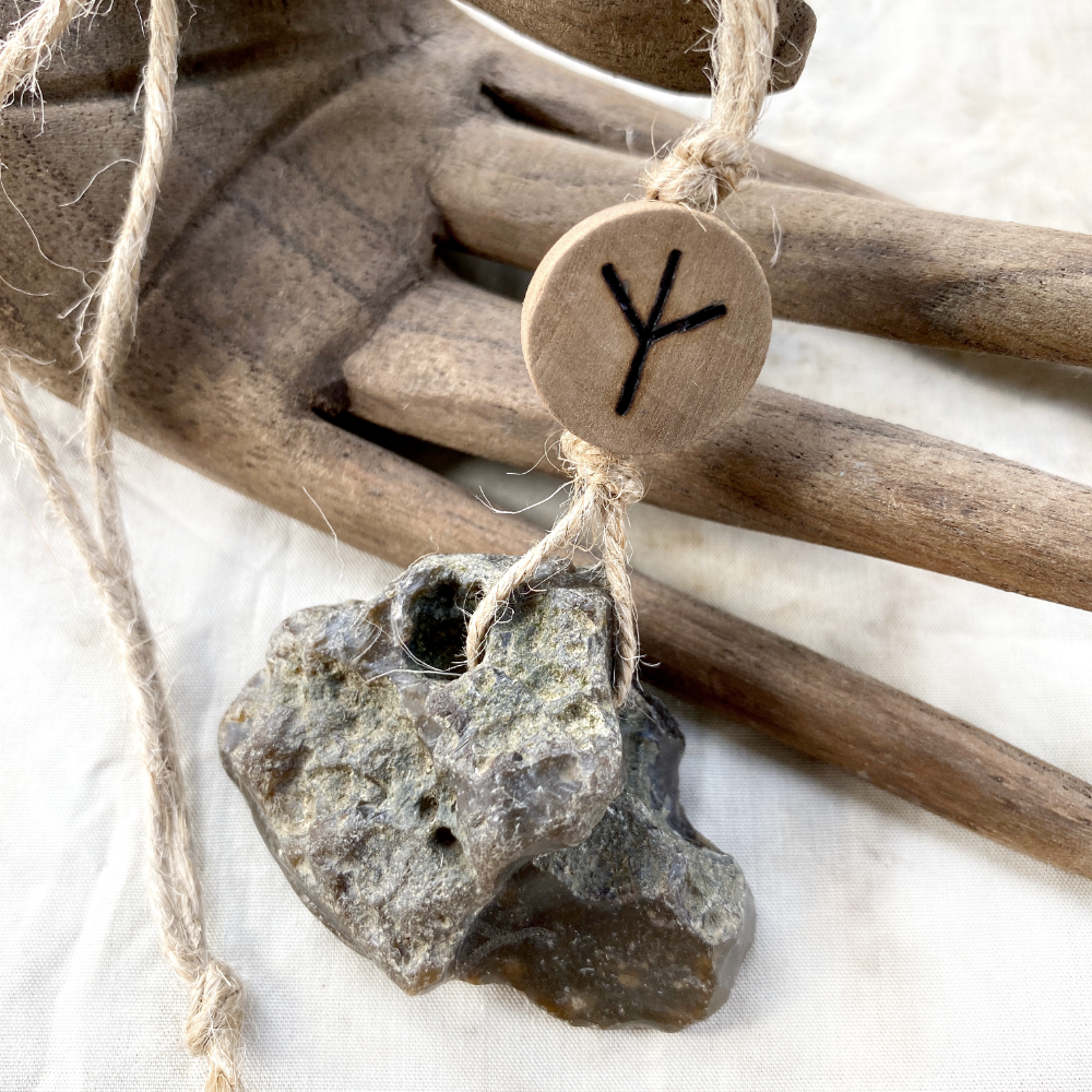 Flint hagstone ('holey' stone) with Algiz rune – Spirit Carrier