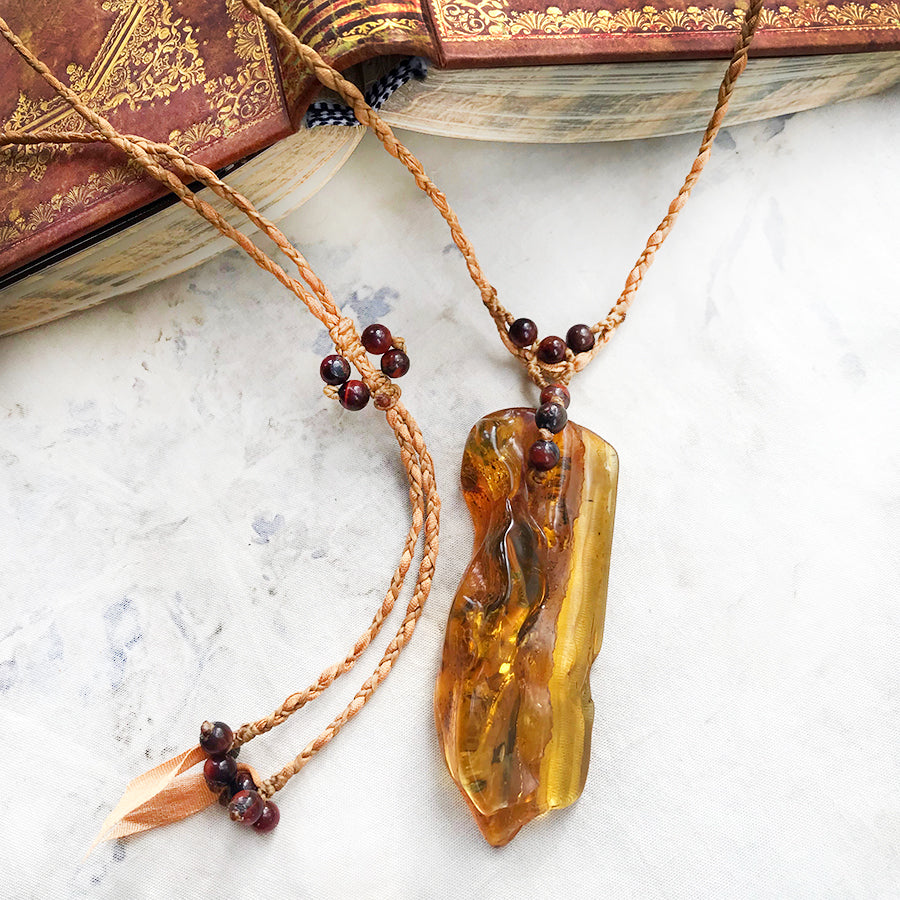 Amber crystal healing amulet with Red Tiger Eye – Spirit Carrier